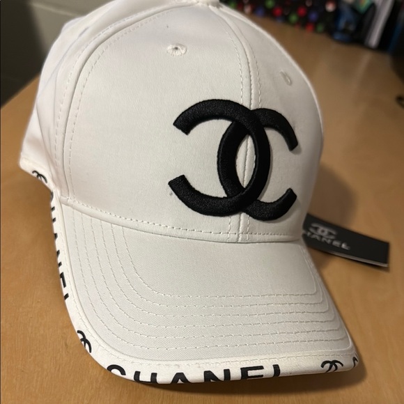 CHANEL | Accessories | Chanel White Cap With Black Logo | Poshmark